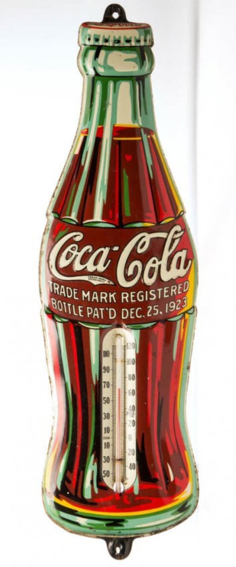 Coca-Cola oversized embossed glass Christmas bottle Value & Price Guide