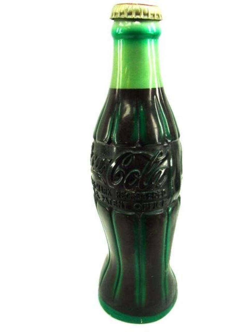 COCA-COLA HARD RUBBER DISPLAY BOTTLE AND BASE Value & Price Guide