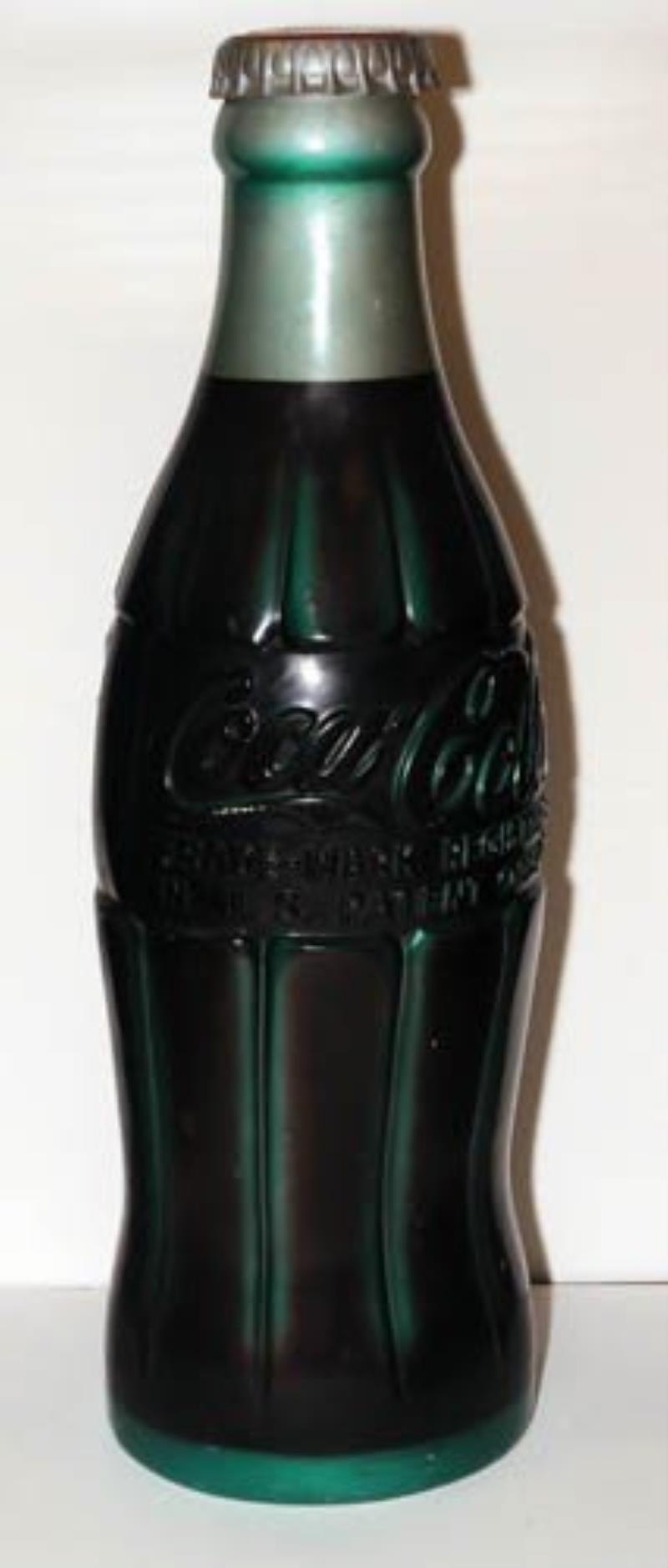 COCA-COLA HARD RUBBER DISPLAY BOTTLE AND BASE Value & Price Guide