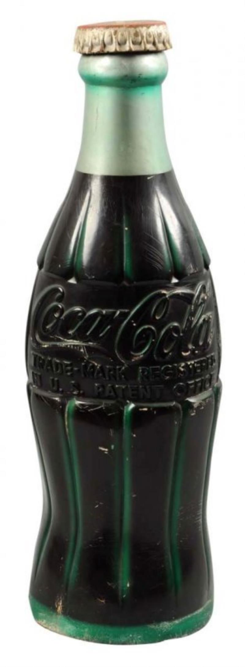1950s Coca-Cola Rubber Display Bottle & Base Value & Price Guide